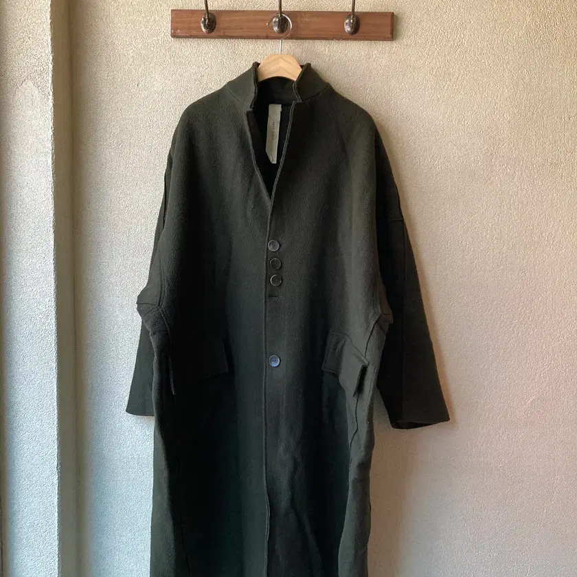 Dami Dorma wool coat on Bunjang Global Site.