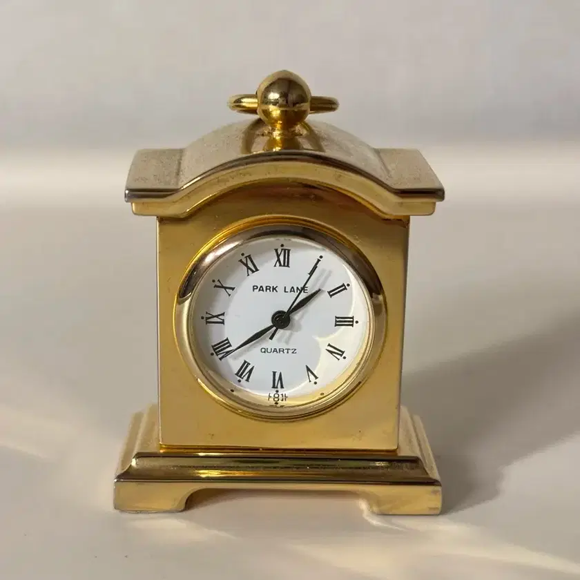 Vintage miniature table clock on Bunjang Global Site.