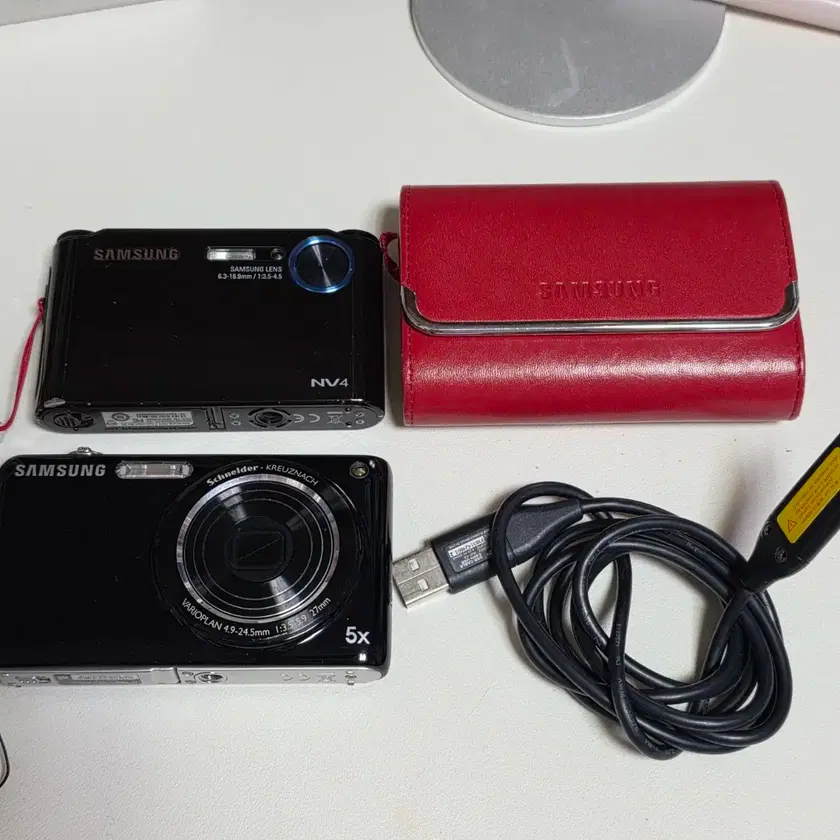 Samsung VLUU ST600, NV4 2 vintage cameras for sale on Bunjang Global Site.