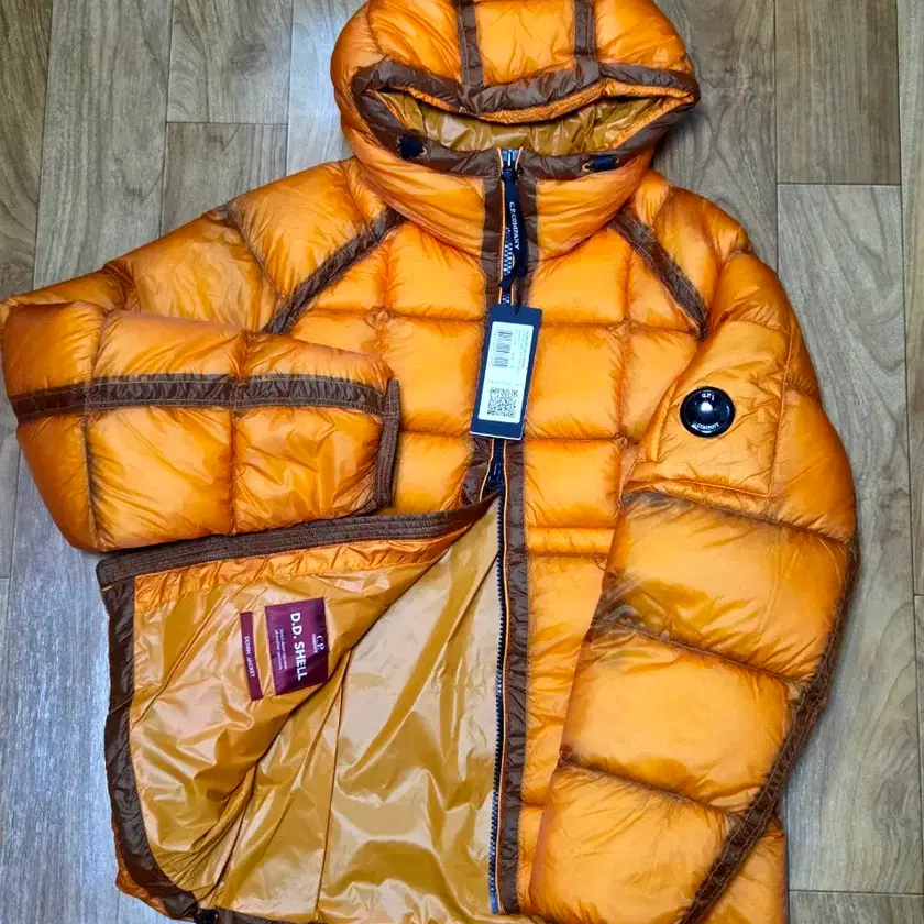 CP Company 25FW DD Shell down jacket, russet orange on Bunjang Global Site.